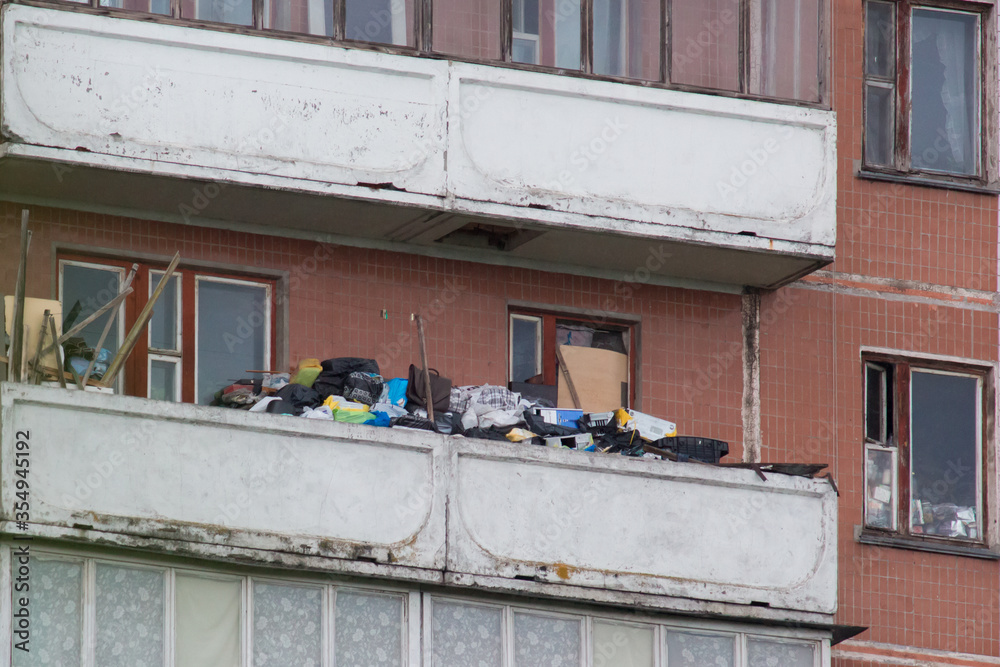 Balcony in the apartment of people who suffers from compulsive hoarding ...