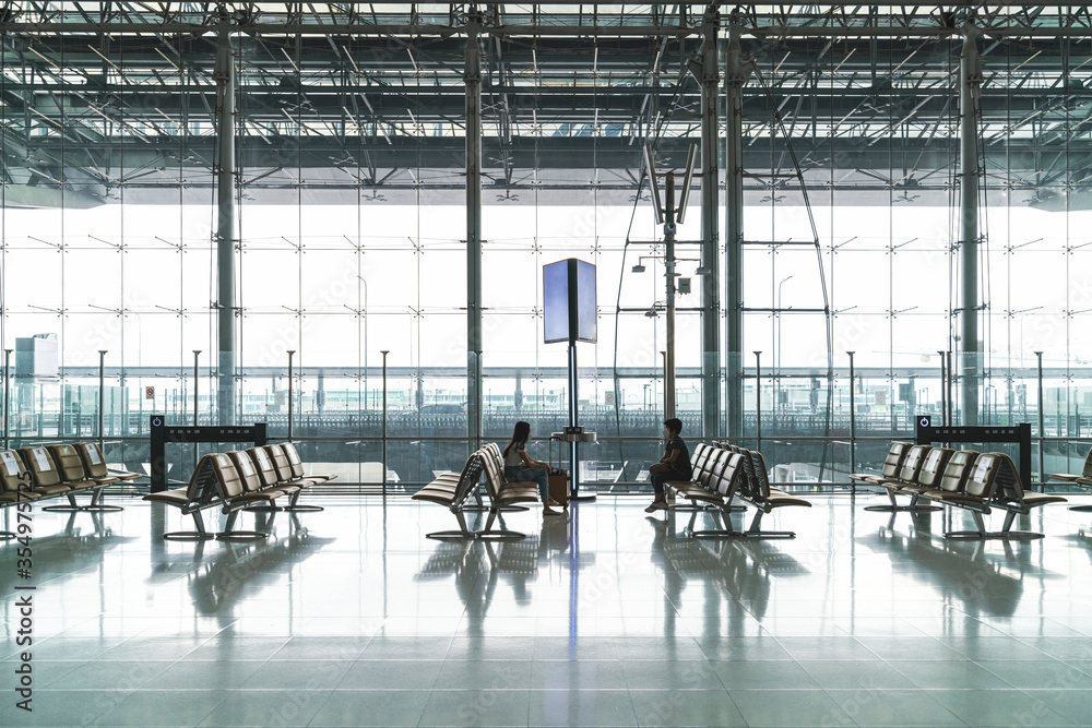 empty check-in desk and airport terminal due to pandemic of coronavirus ...