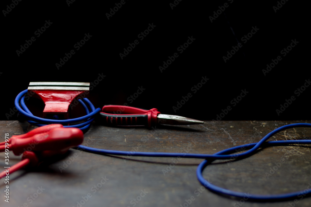 red tools on a work table on a black background, toolroom concept Stock ...