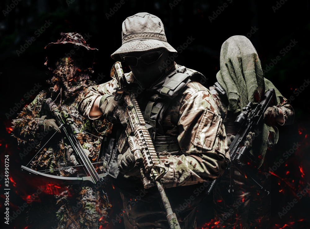 Shaded camouflaged soldiers in uniform standing with weapons. Stock ...