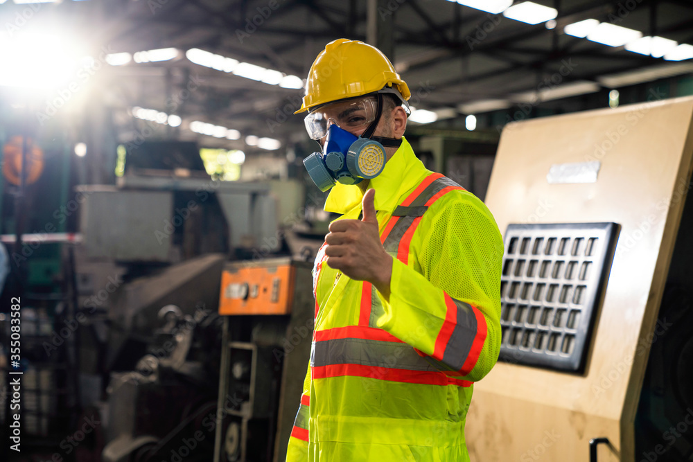 An engineer working in the the industrial. Asian portrait of a young ...