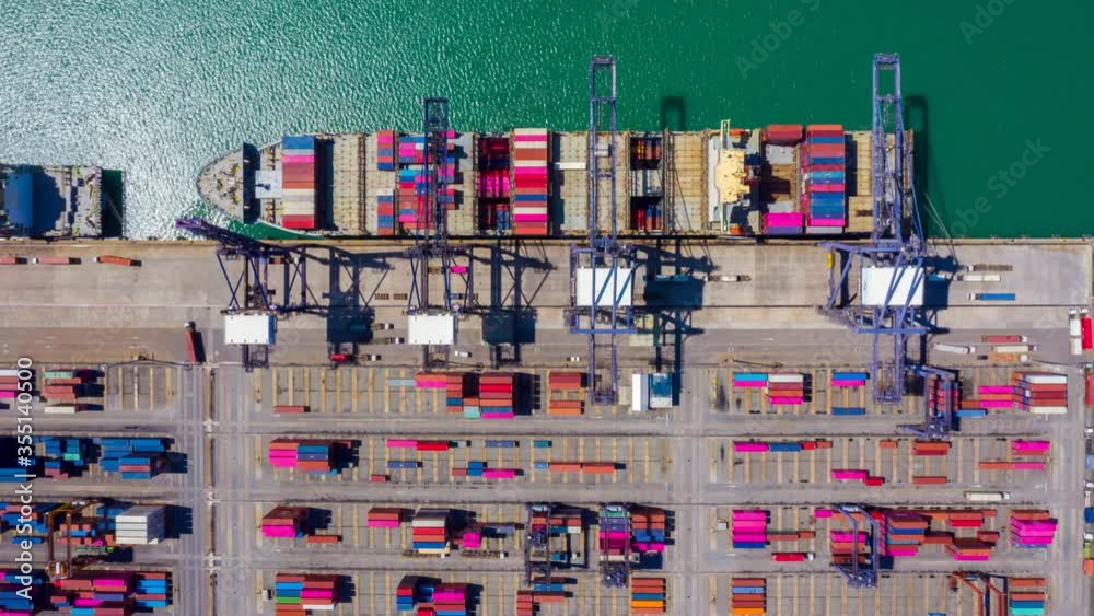 Time lapse 4K, Aerial top view Container cargo freight ship with ...