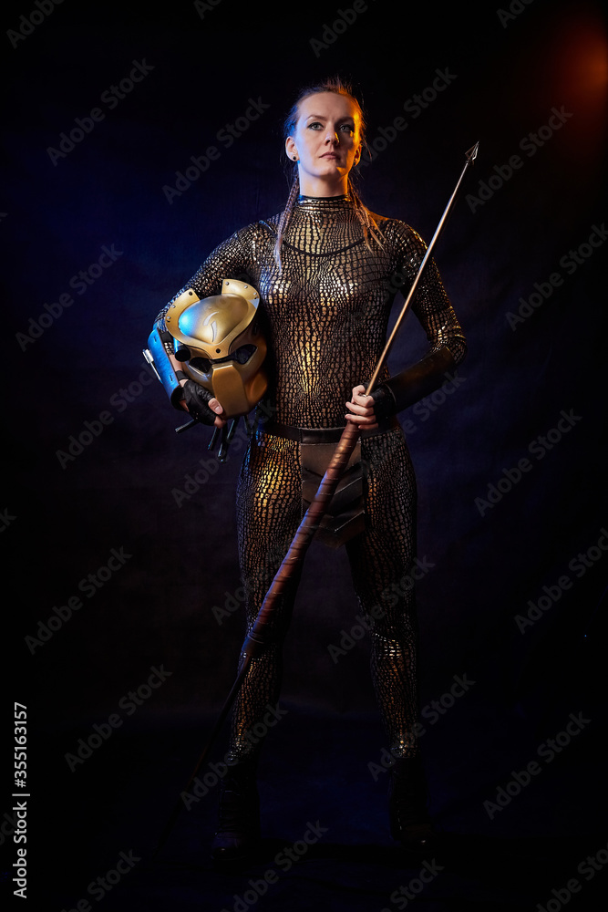 Fotografia do Stock: Valkyrie girl in shiny military armor and with a ...