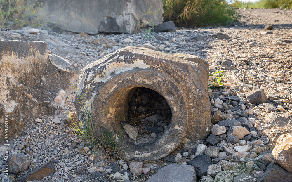 The remains of an ancient sewer pipe in ruins of the Greek - Roman city ...