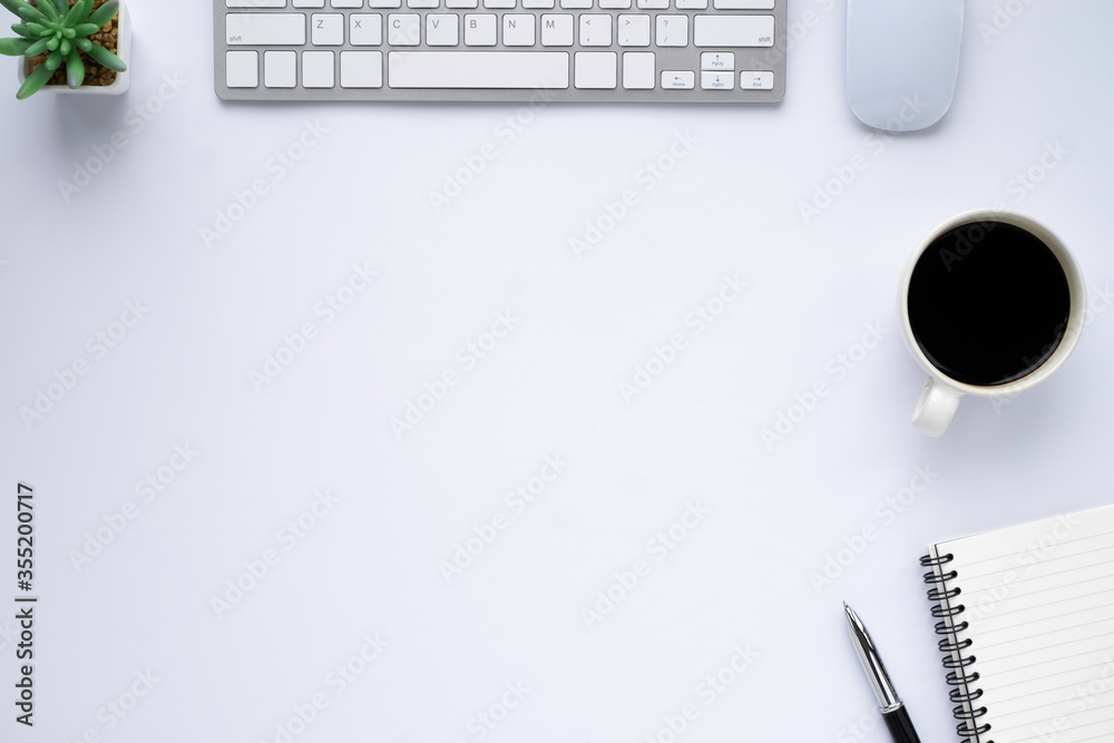 Workspace in office with white table. Top view from above of keyboard ...