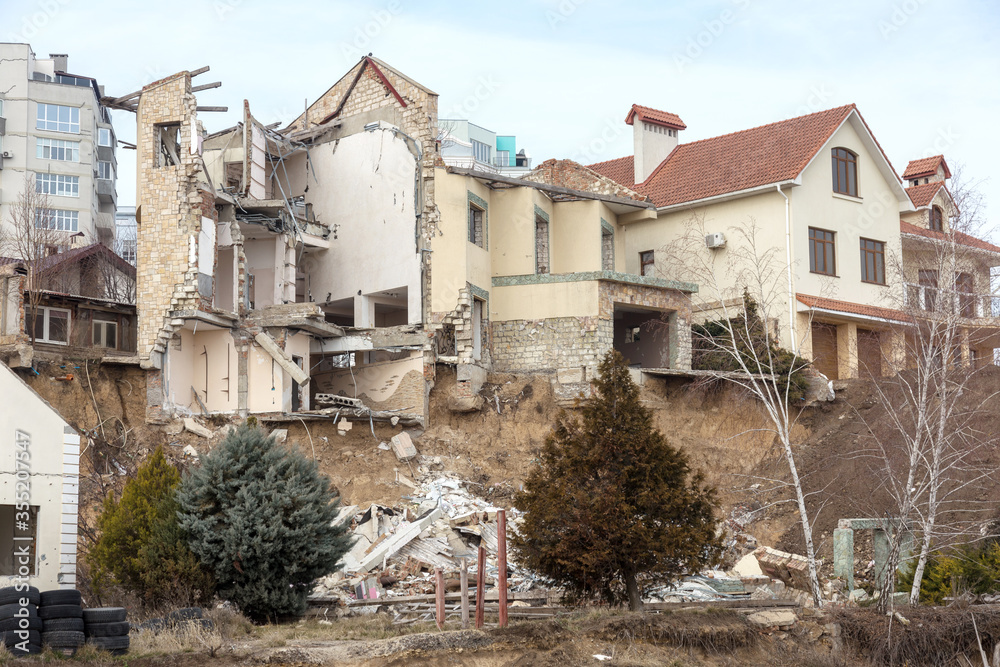 Landslide caused by rains of hurricane destroyed expensive cottages and ...