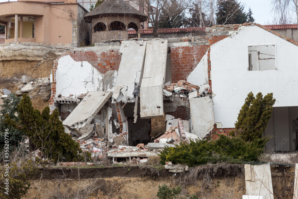 Landslide caused by rains of hurricane destroyed expensive cottages and ...