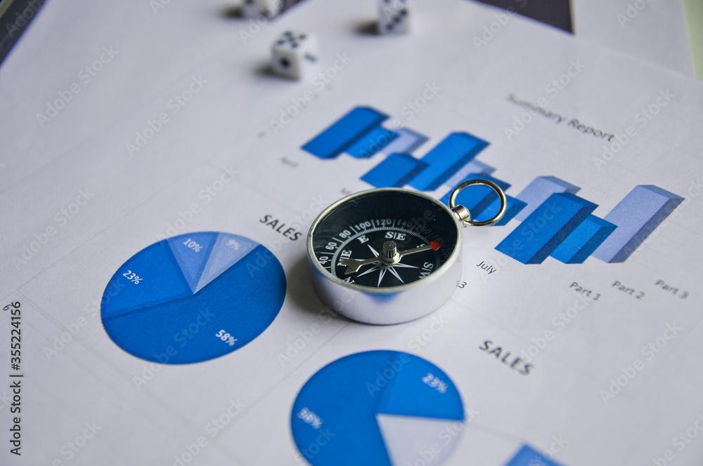 compass on paper work with diagram. Business ideas concept with dice ...