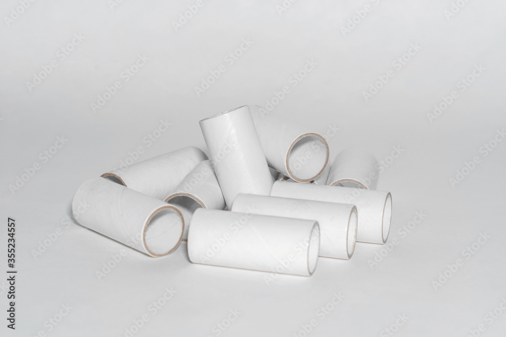 Paper tube cores, tissues isolated on white background, in industry ...