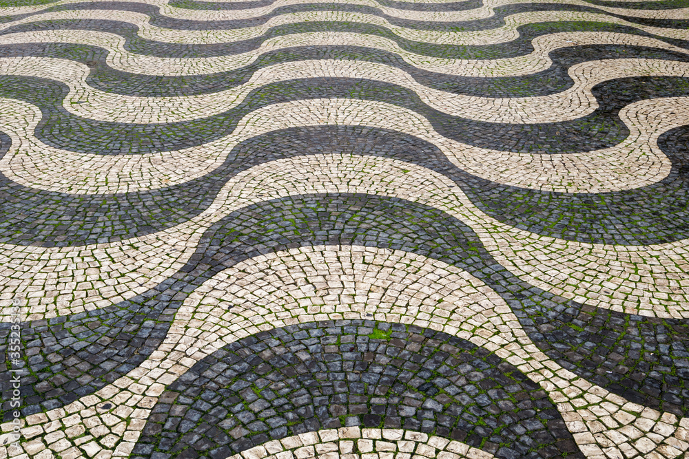 Wave pattern Portuguese paving on Rossio (King Pedro IV) square (Praca ...