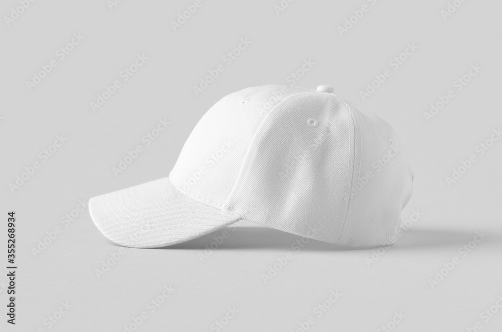 White baseball cap mockup on a grey background, side view. Stock Photo ...