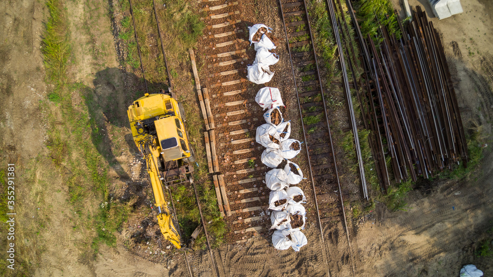 Railway works. Railroad deconstruction and modernisation site. Top-down ...