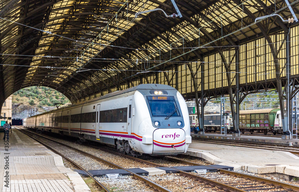 PORTBOU, SPAIN - NOWEMBER 09, 2013: High-speed Renfe train at Portbou ...