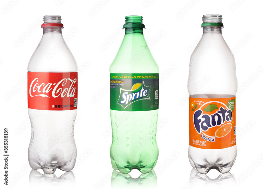 Empty Coca Cola, Fanta and Sprite bottles. Stock Photo | Adobe Stock