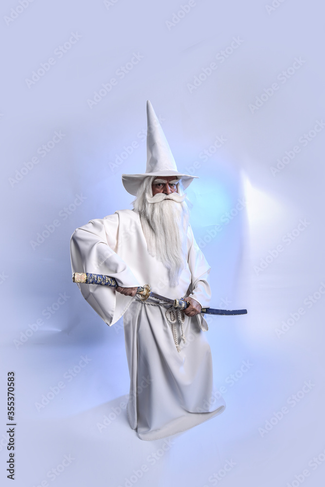 Portrait of a courageous and brutal, majestic old man, wizard, sorcerer ...