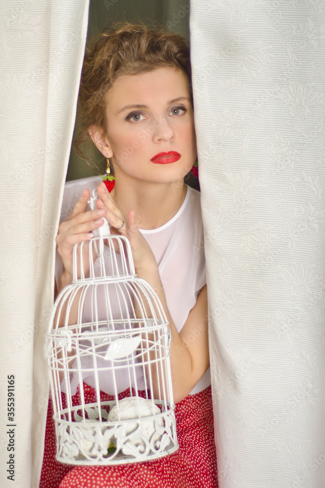 Portrait woman or girl in light, white and red clothes, a skirt and a ...