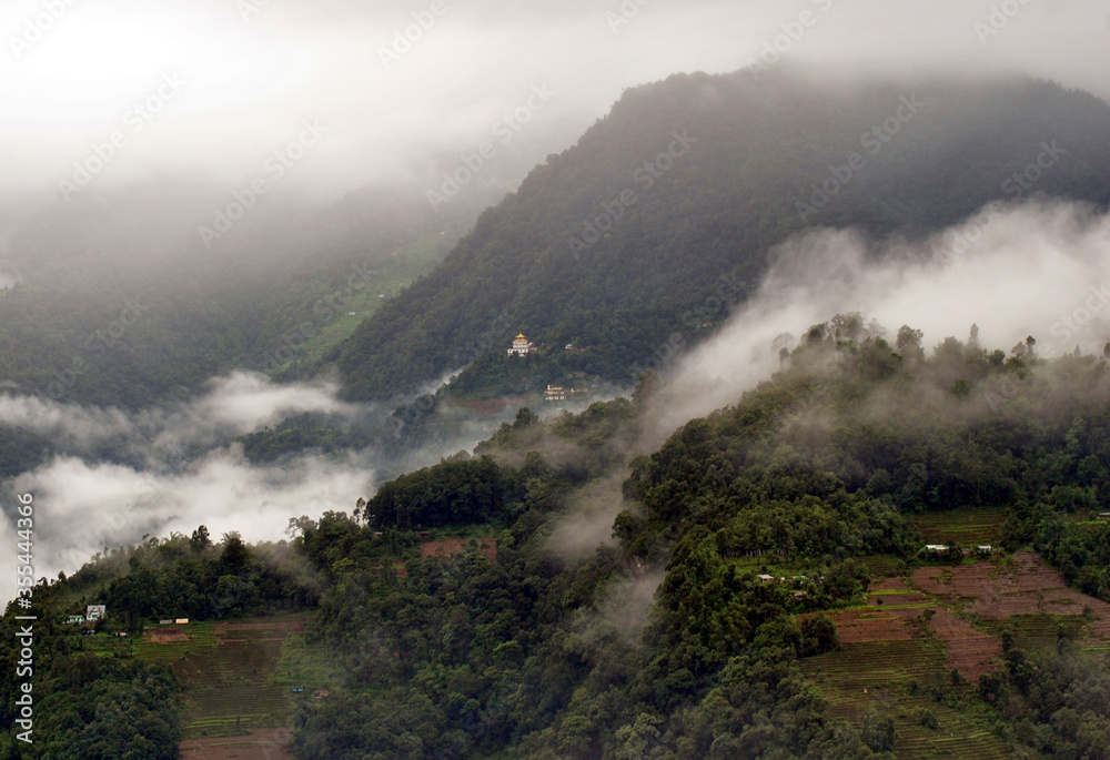 Mist and fog engulfed the verdant green lush Ranka village looks ...