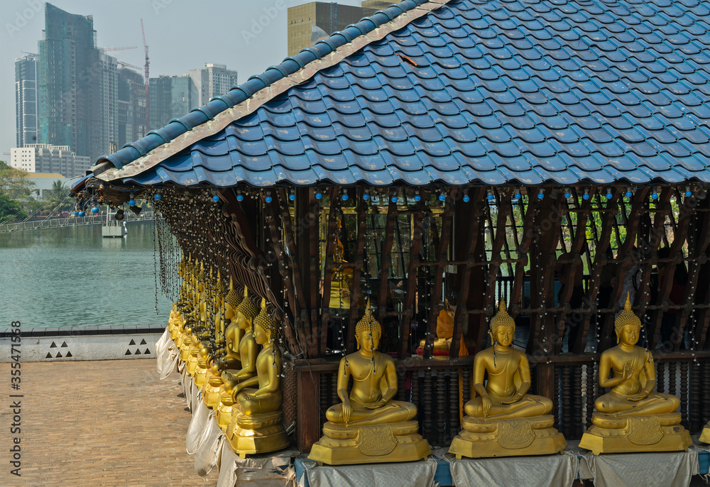 Buddha golden statues in Seema Malaka temple, Colombo city, Sri Lanka ...