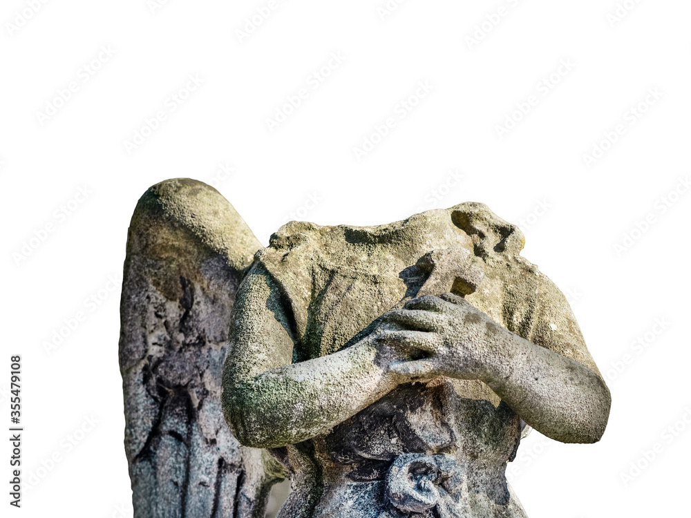 Ancient schulpture of a headless stone angel with a cross on white ...