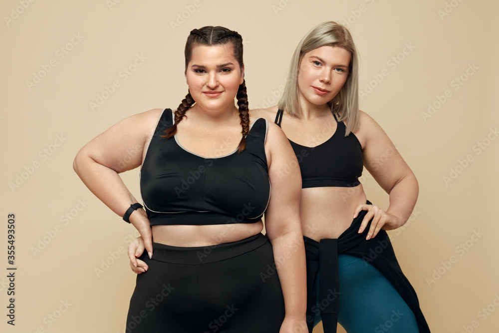 Fitness. Plus Size Models Portrait. Blonde And Brunette Women In Sport ...