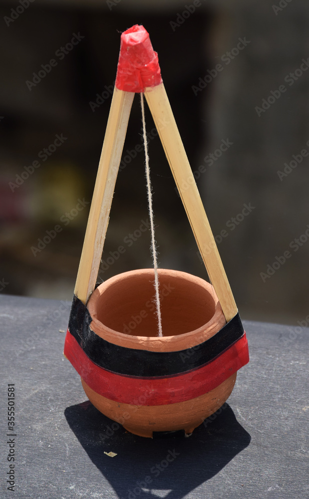 Miniature version of Indian folk musical instrument Ektara which is ...