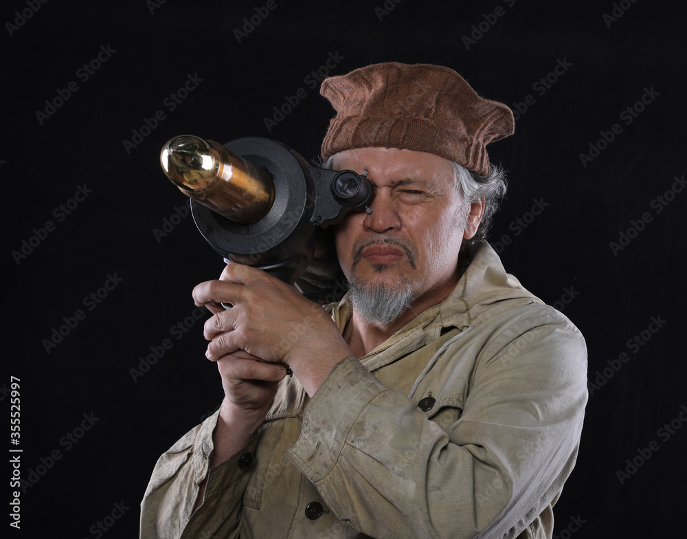 military man with a rocket launcher Stock Photo | Adobe Stock