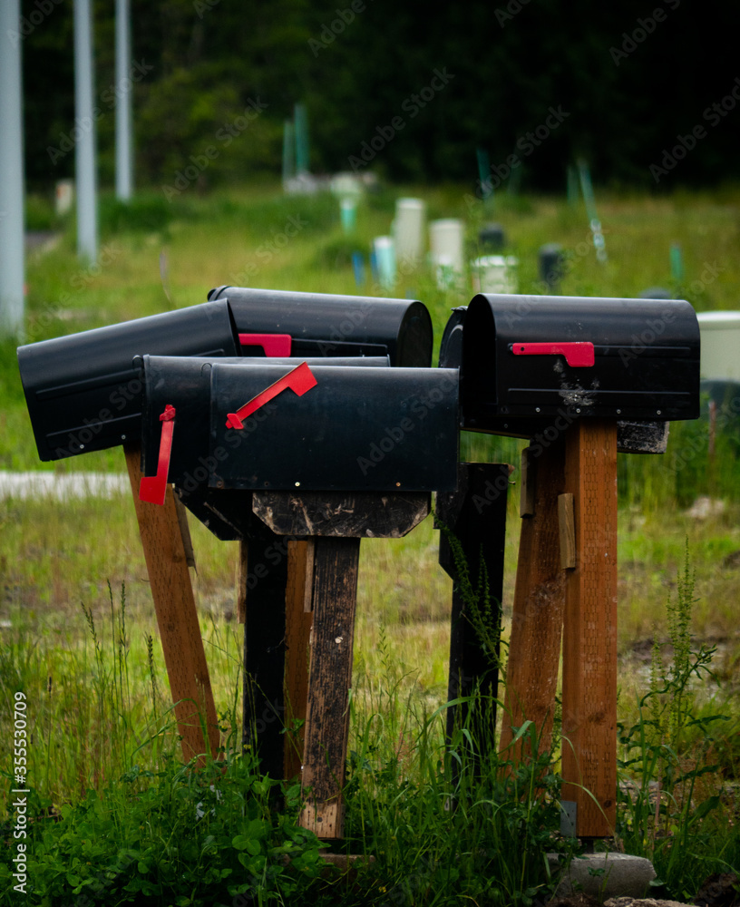 Group of new mailboxes on location of new construction site of home ...