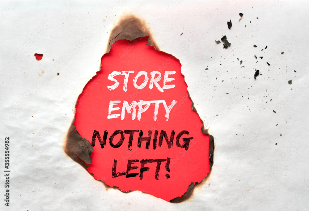 Protests, riots and looting, aftermath concept. Paper hole with burned ...