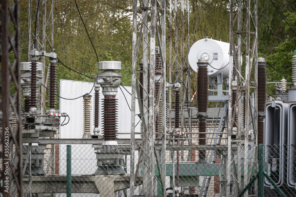 high-voltage wires and insulators in a modern substation. Isolation and ...