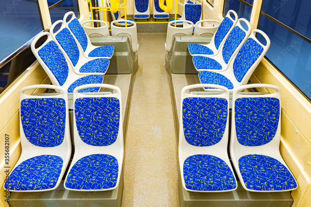 Interior of the bus. Seats. Modern tram from the inside. Urban ...