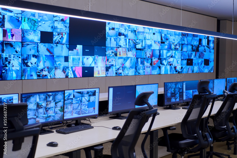 Empty interior of big modern security system control room Stock Photo ...
