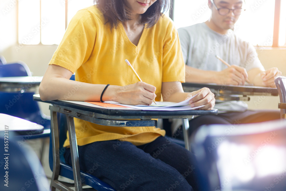 high school,university student study.hands holding pencil writing paper ...