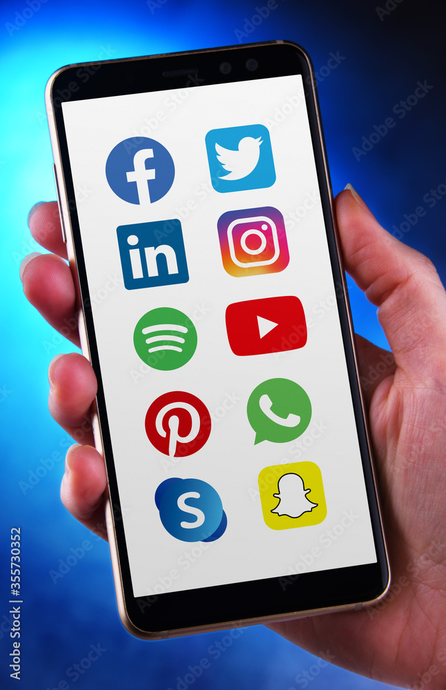 Smartphone displaying logos of popular social media platforms Stock ...