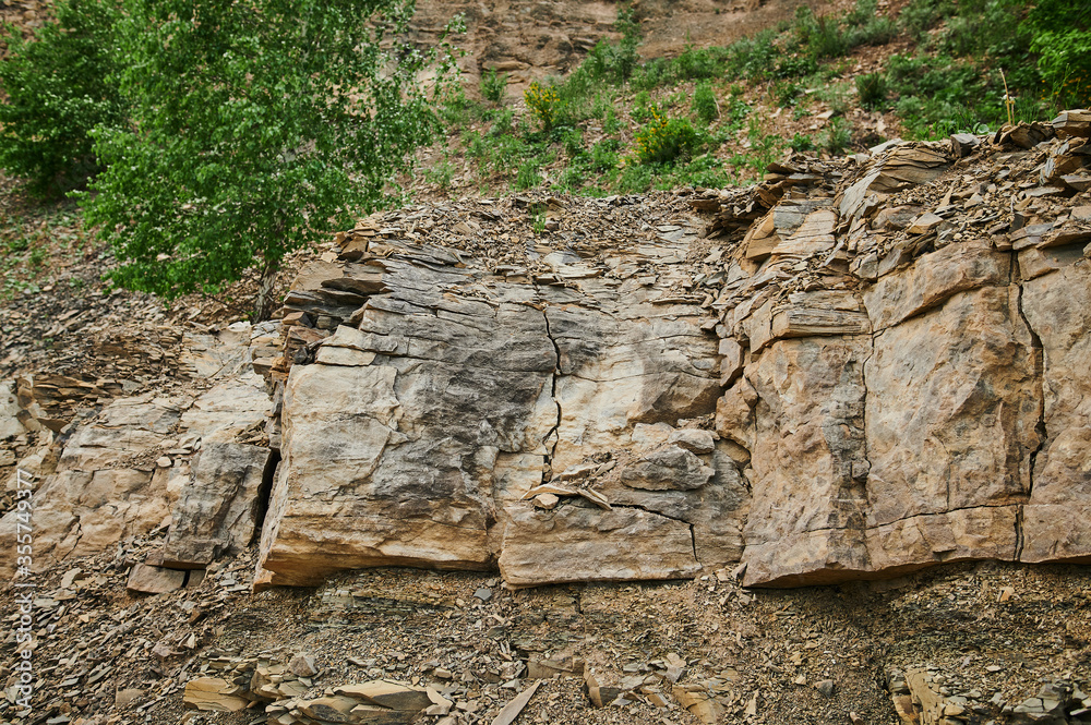 Layers of soil with groundwater. Details of earth layers in a clay pit ...