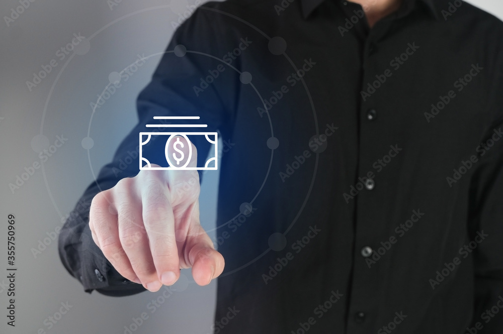 Currency exchange, business man pressing a dollar banknote button on a ...