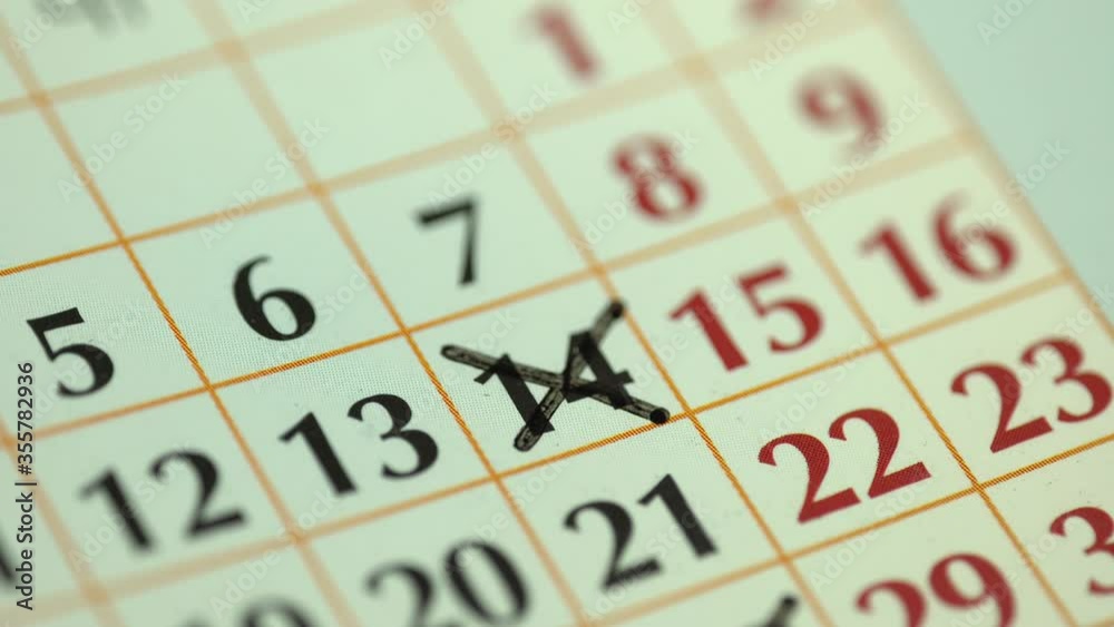 14th – fourteenth day of the month. The woman crossed out the calendar ...