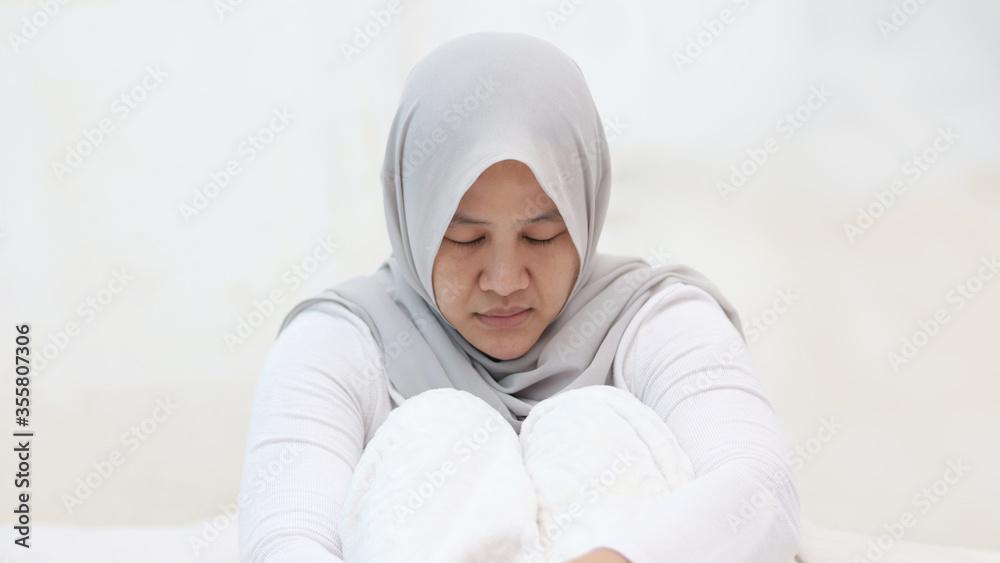 Sad muslim woman crying in sorrow, feeling lonely, depression concept ...