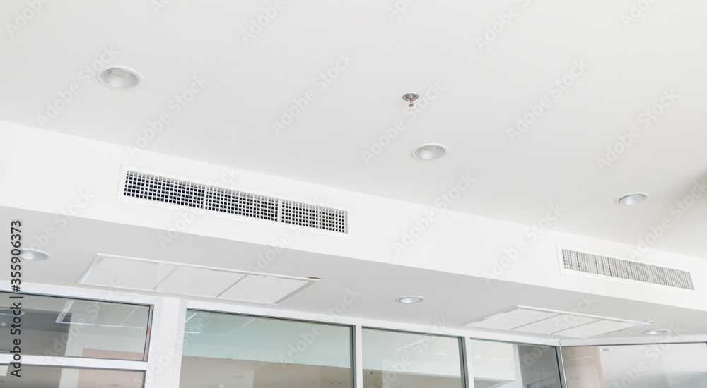Ceiling mounted cassette type air conditioner Stock Photo | Adobe Stock