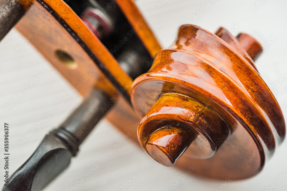 Closeup of beautiful aesthetic carving violin scroll at the end of the ...