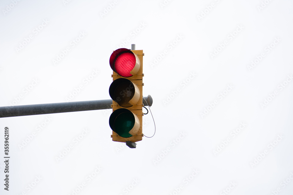 A red traffic light stop light / trafficlight stoplight isolated with a ...