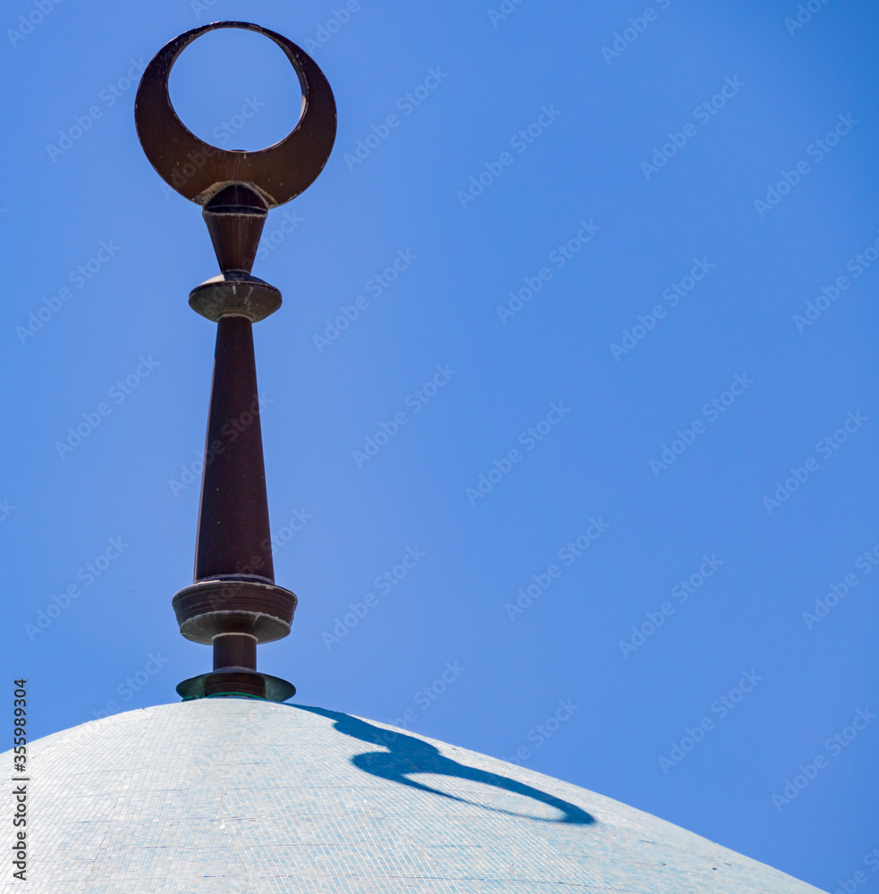 Crescent moon symbol of Islam with shadow on top of King Abdullah ...