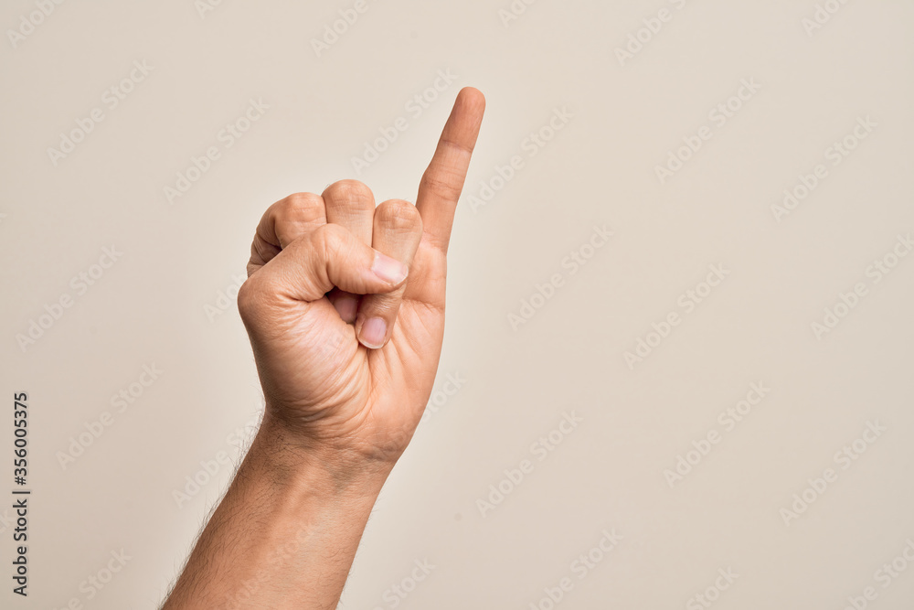 Hand of caucasian young man showing fingers over isolated white ...