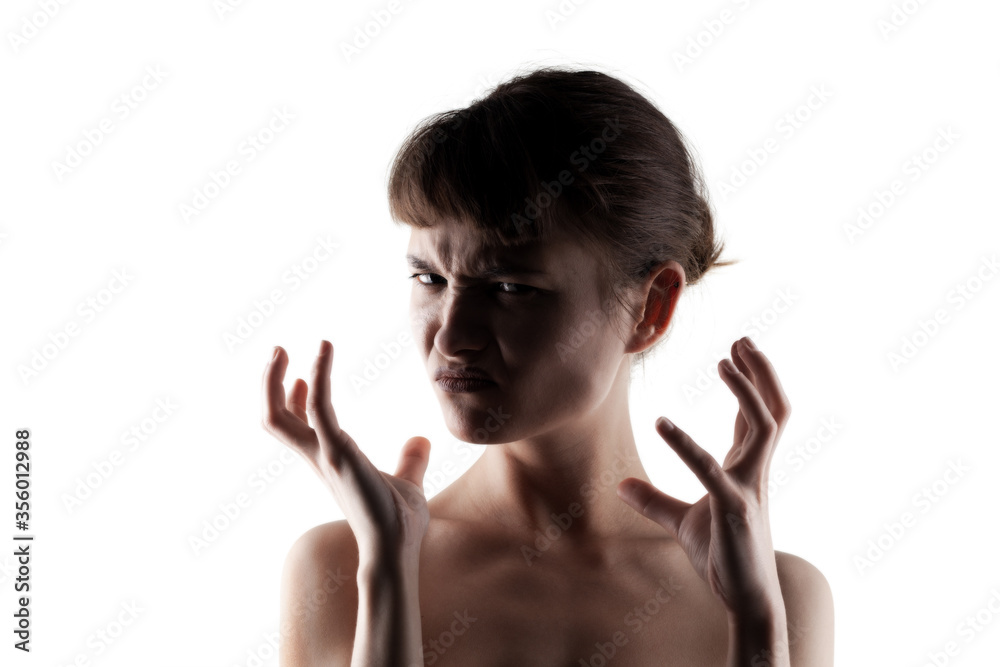Angry cute girl, half silhouette portrait. Mad face and riising hands ...