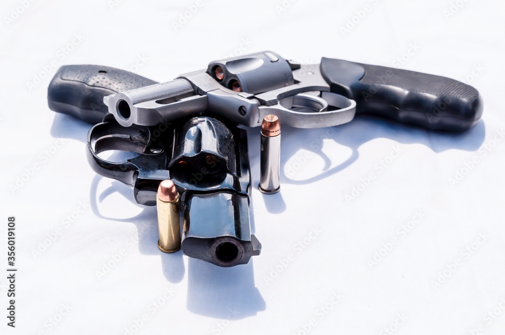 Two revolvers, a 357 magnum and a 38 special with hollow point bullets ...