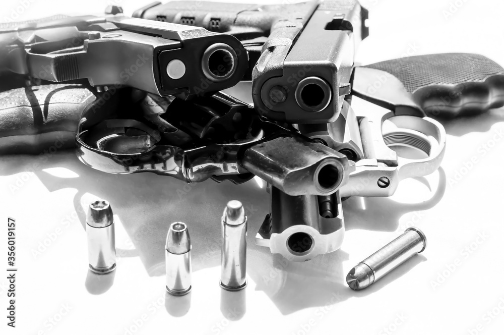 Four handguns, two revolvers, a 38 caliber and a 357 magnum and two ...