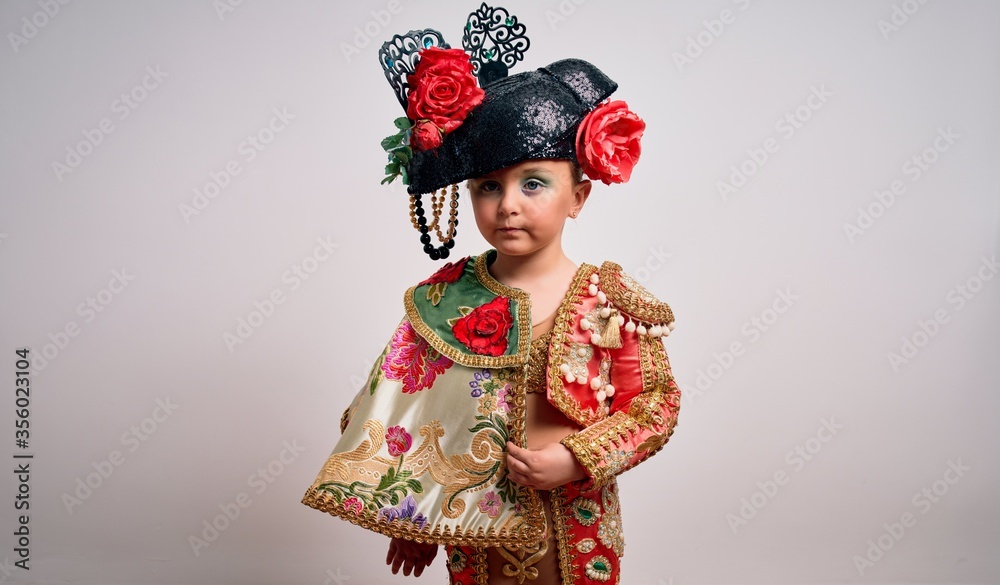 Young little caucasian kid girl wearing bullfighter traditional folkore ...
