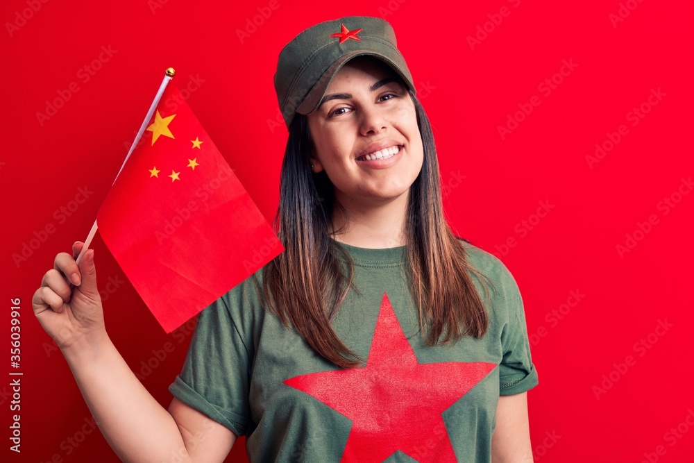 Beautiful patriotic woman wearing t-shirt with red star communist ...
