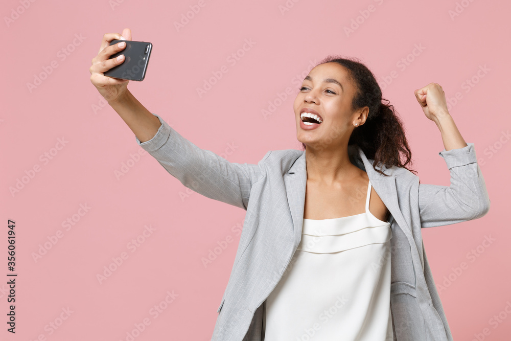 Happy african american business woman in grey suit, white shirt ...