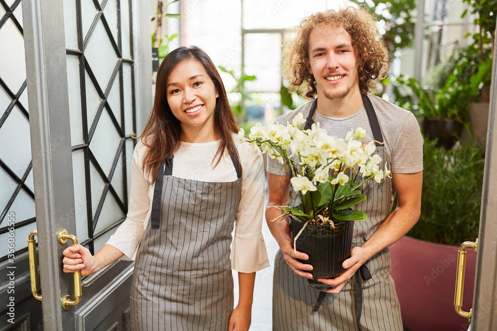 Florist team at delivery of flower Stock Photo | Adobe Stock