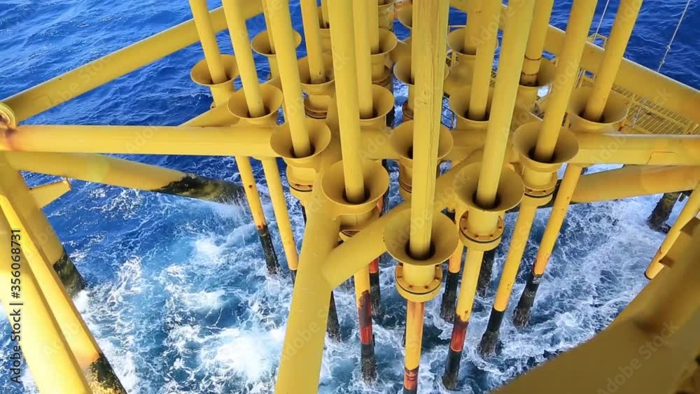 Wellhead slot of the oil and gas platform in the gulf. The construction ...